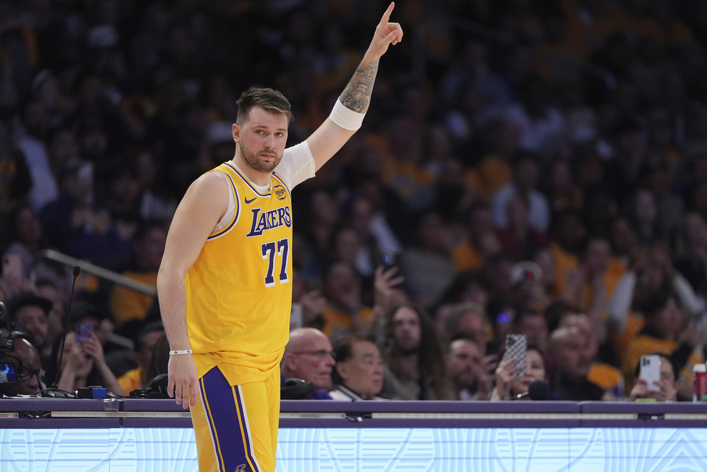 Luka Doncic makes his Lakers debut and quickly connects with LeBron James in a 132-113 win over ...