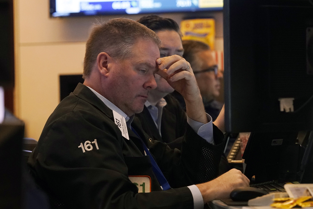 Wall Street falls in a manic day after briefly dropping more than 10% ...
