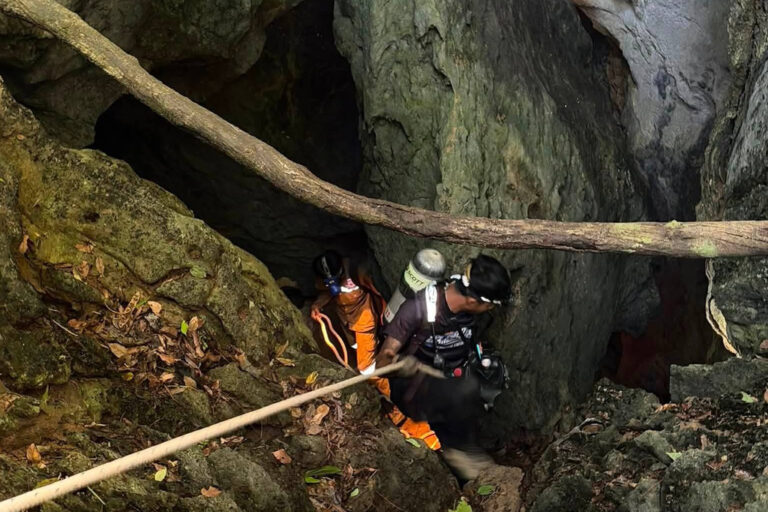 Rescuers search for alternative route to reach 2 missing in a flooded ...
